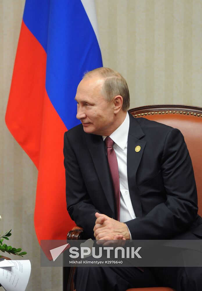 Russian President Vladimir Putin takes part in APEC Summit in Peru ...