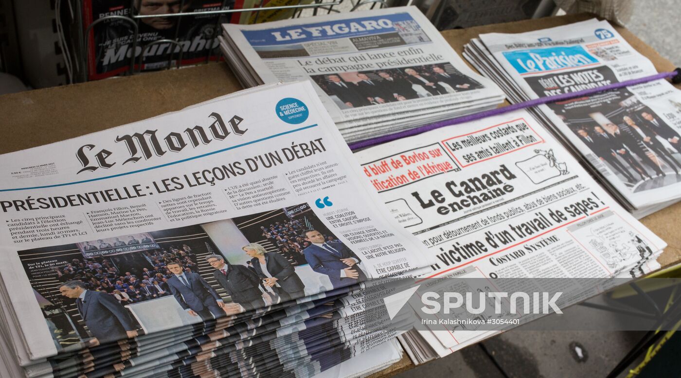 Front pages of French newspapers covering presidential debate | Sputnik ...